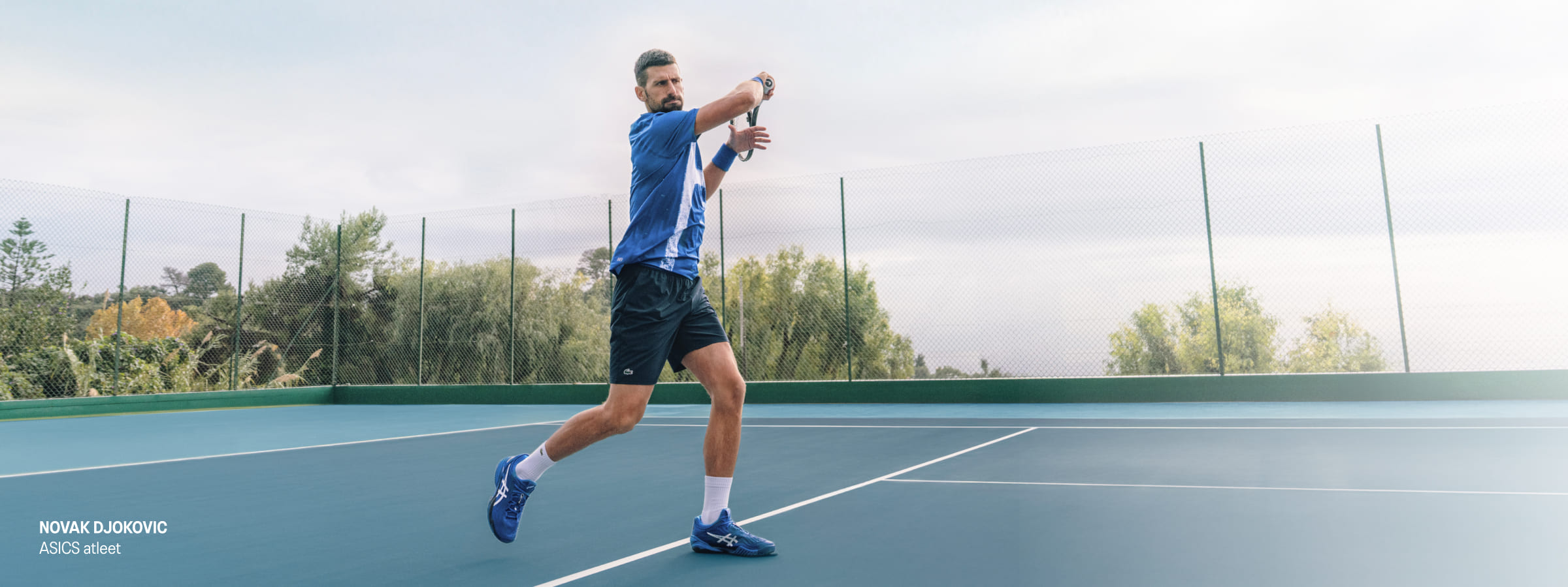 Blue Tennis Man Logo