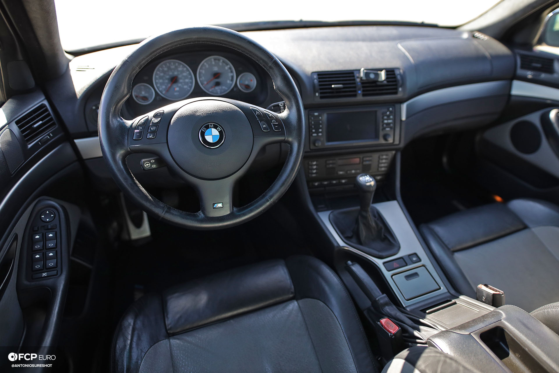 One Fine E39: MotoIQ's Murdered Out BMW M5 | FCP Euro