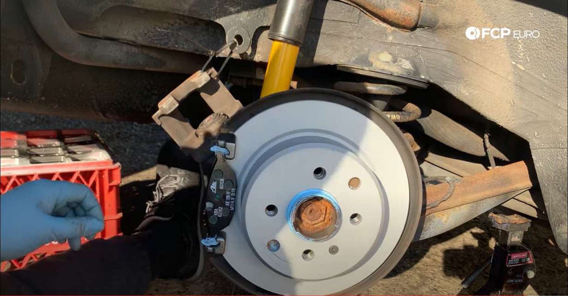 How To Replace The Rear Brake Pads And Rotors On A BMW E30 | FCP Euro