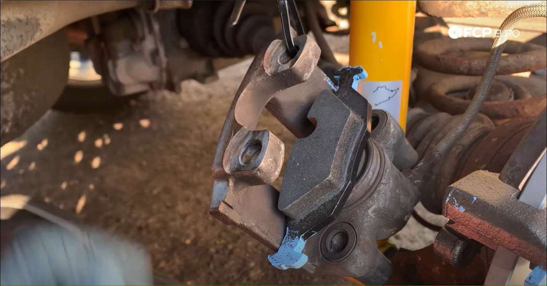 How To Replace The Rear Brake Pads And Rotors On A BMW E30 | FCP Euro