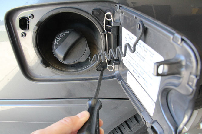 How to Replace a Fuel Door Hinge on a P2 Volvo | FCP Euro