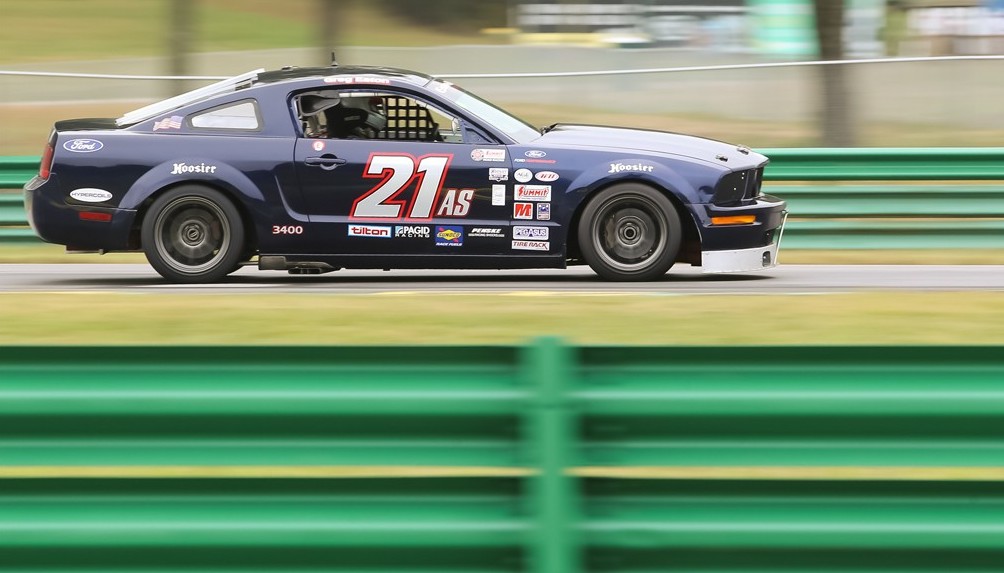 Eaton wins messy American Sedan race, earns third championship | RACER