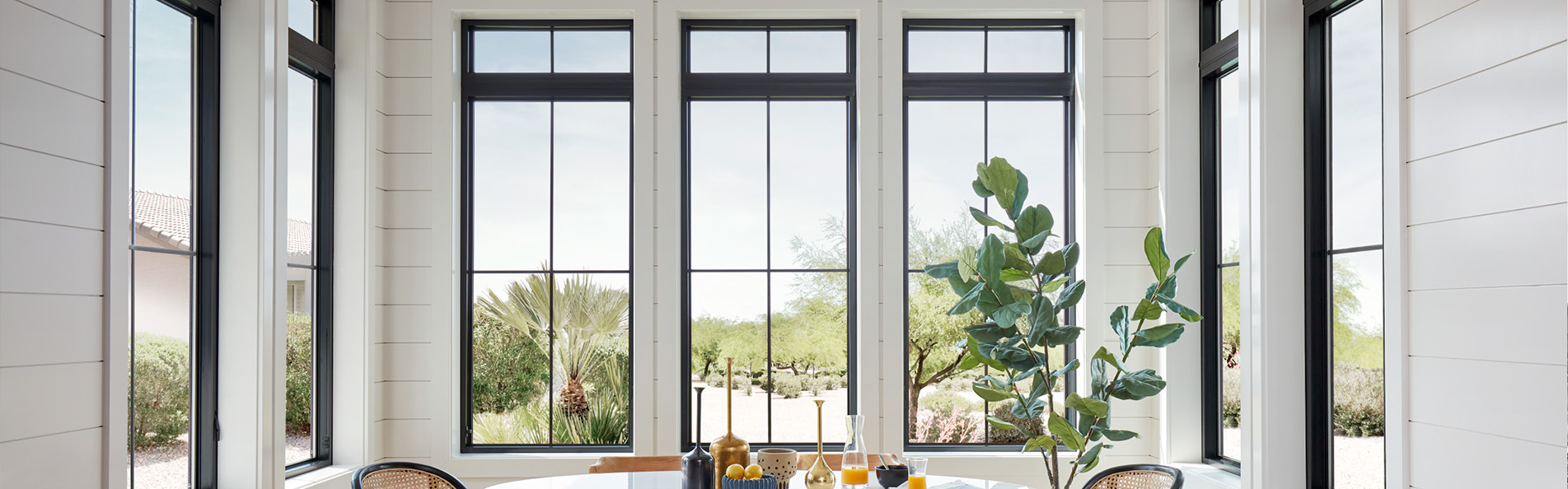 three casement windows with custom grilles