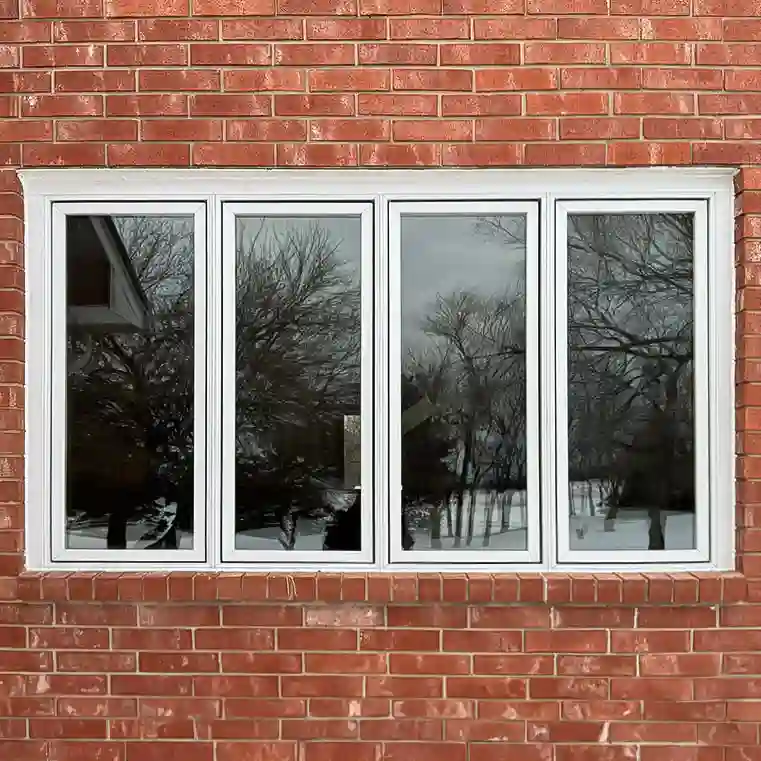 casement-windows-white-exterior-brick-kansas-valley-center.webp